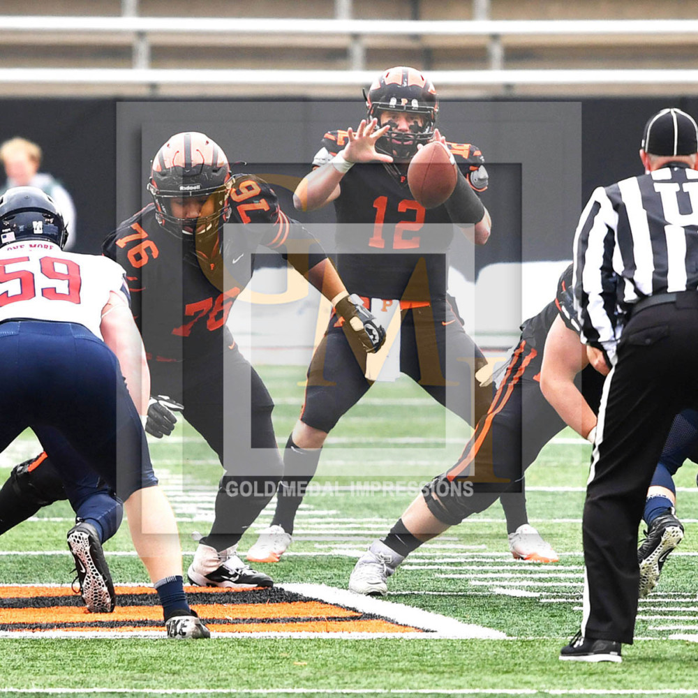 Princeton University star quarterback John Lovett takes the ball - Gold ...